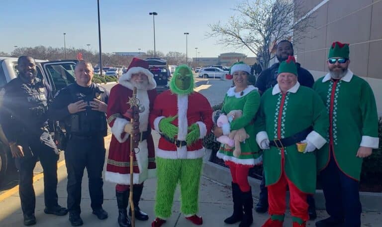 Santa, His Elves And The Grinch Spread Christmas Cheer Through ...
